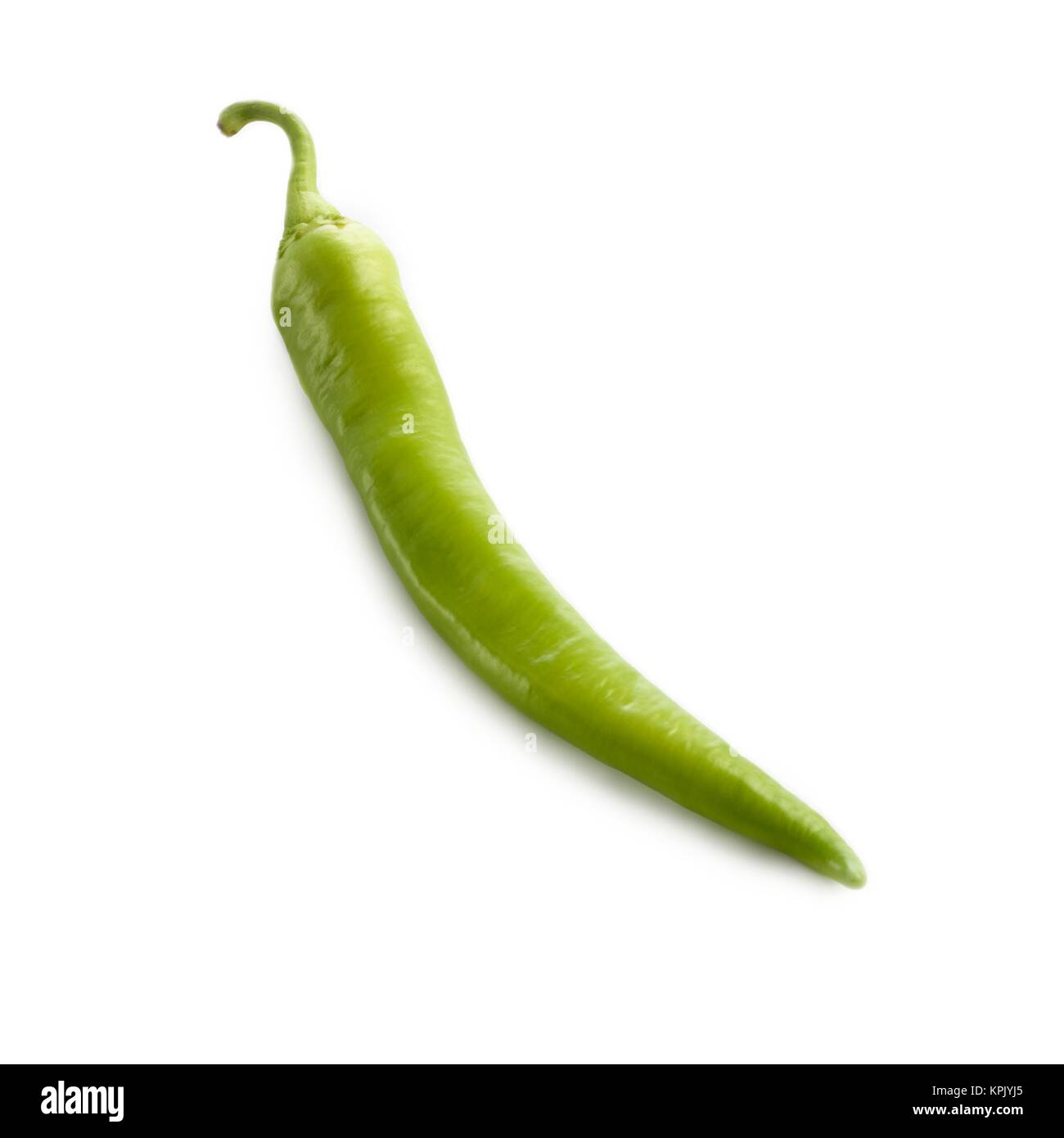 Green chilli against a white background Stock Photo - Alamy