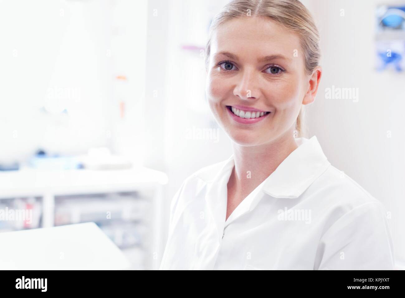 Female doctor smiling towards camera Stock Photo - Alamy