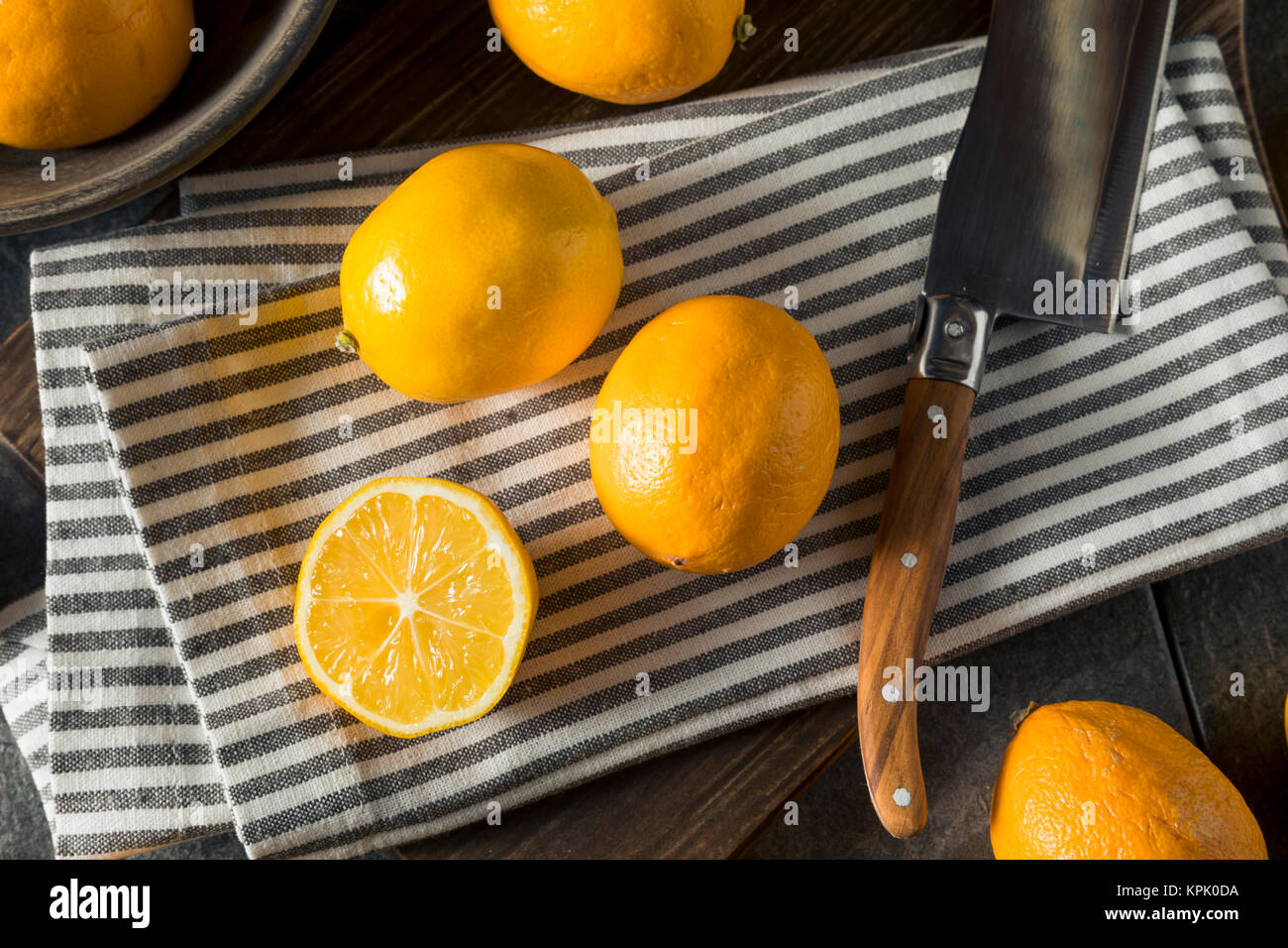 Raw Yellow Organic Meyer Lemons Ready to Juice Stock Photo - Alamy