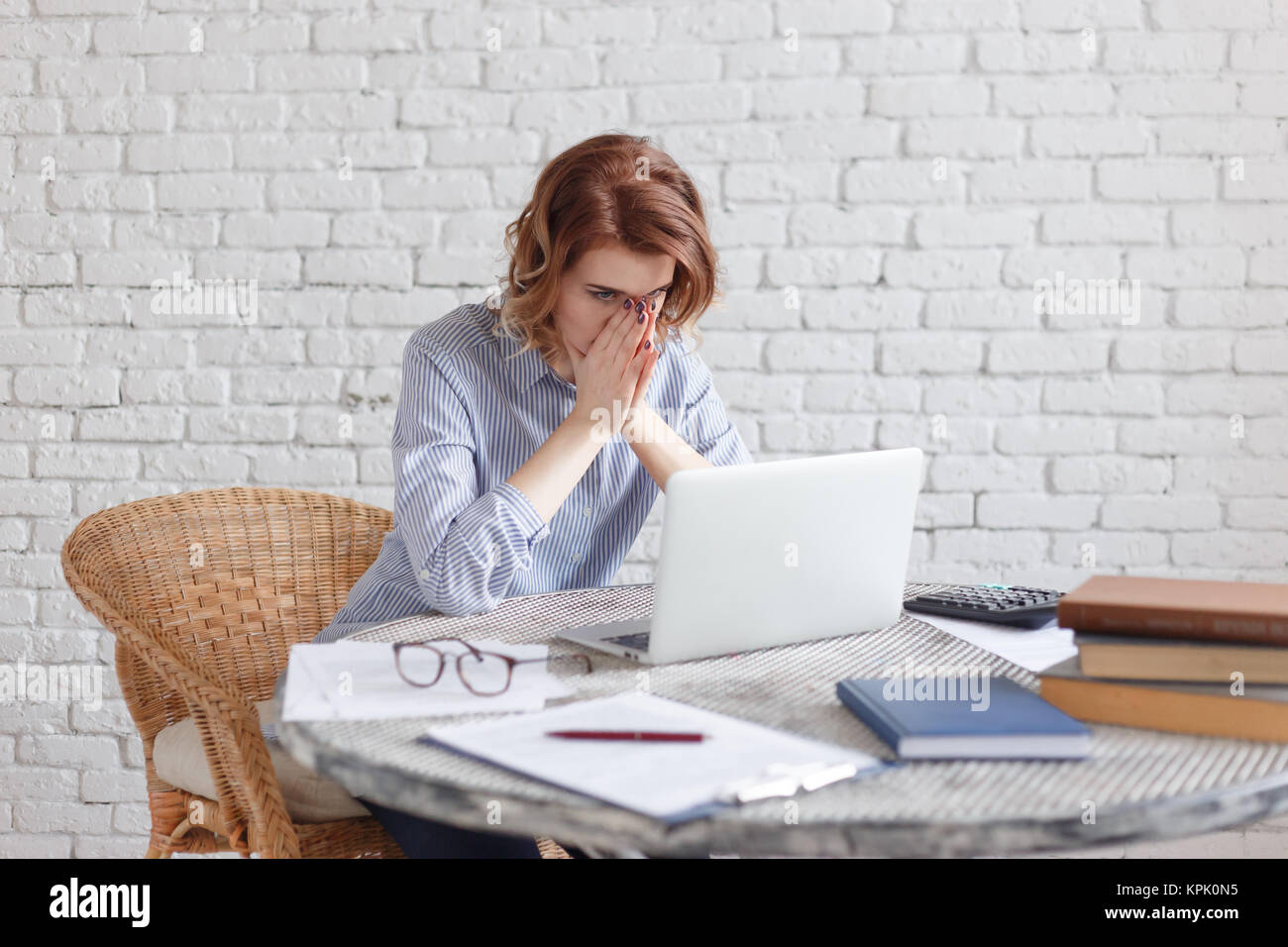 Tired young business woman at work Stock Photo - Alamy