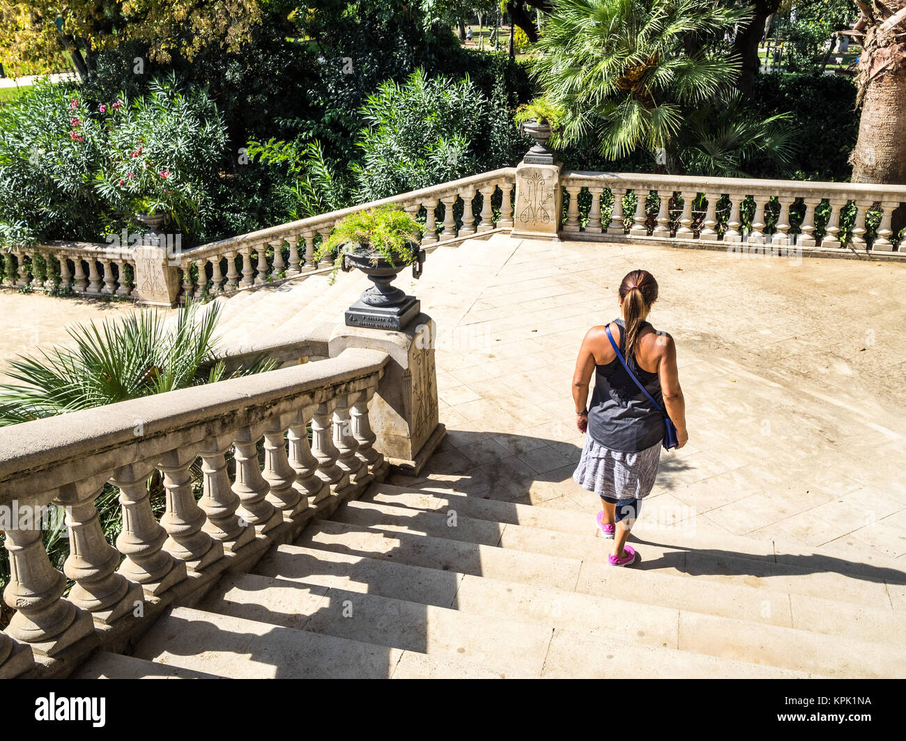 A girl stepping down the steps in the Ciutadella park, Barcelona Stock ...