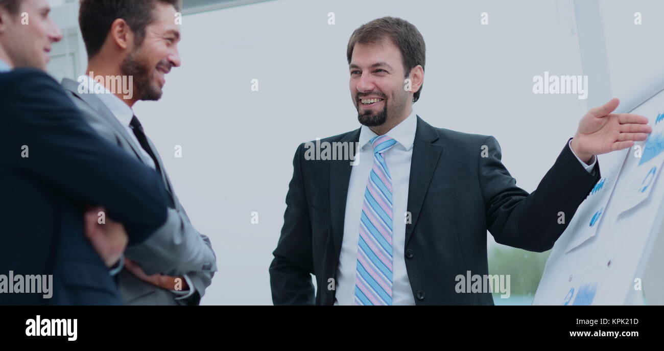 Successful team of coworkers making great meeting discussion in Stock ...