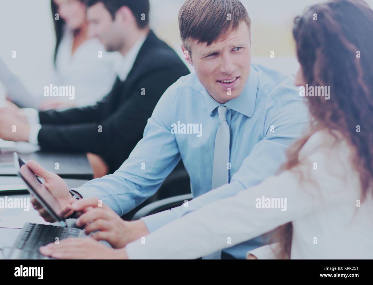 tax consultant is talking with the company accountant in the wor Stock ...