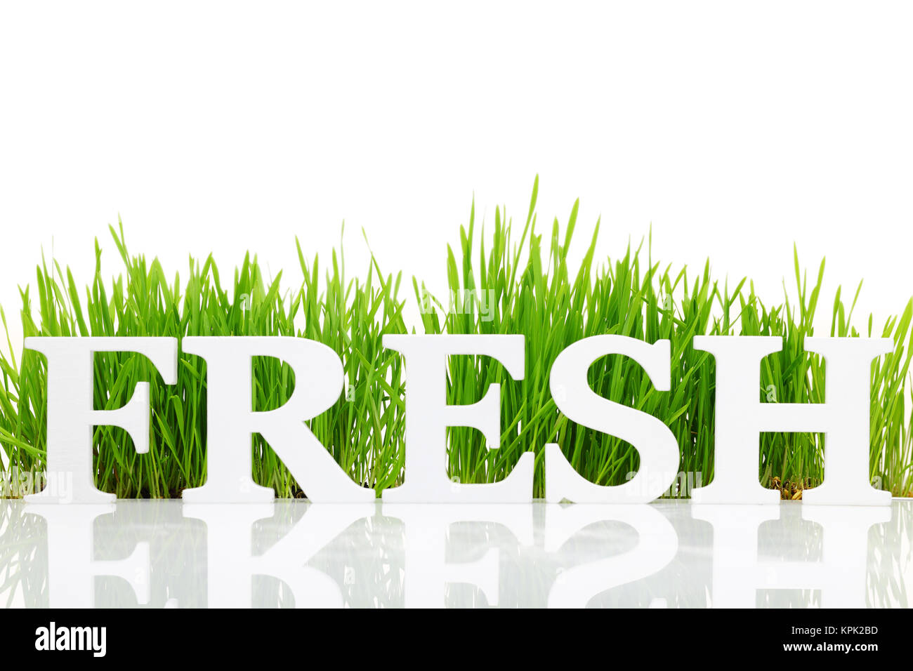 Word "Fresh" with fresh grass isolated on white Stock Photo - Alamy