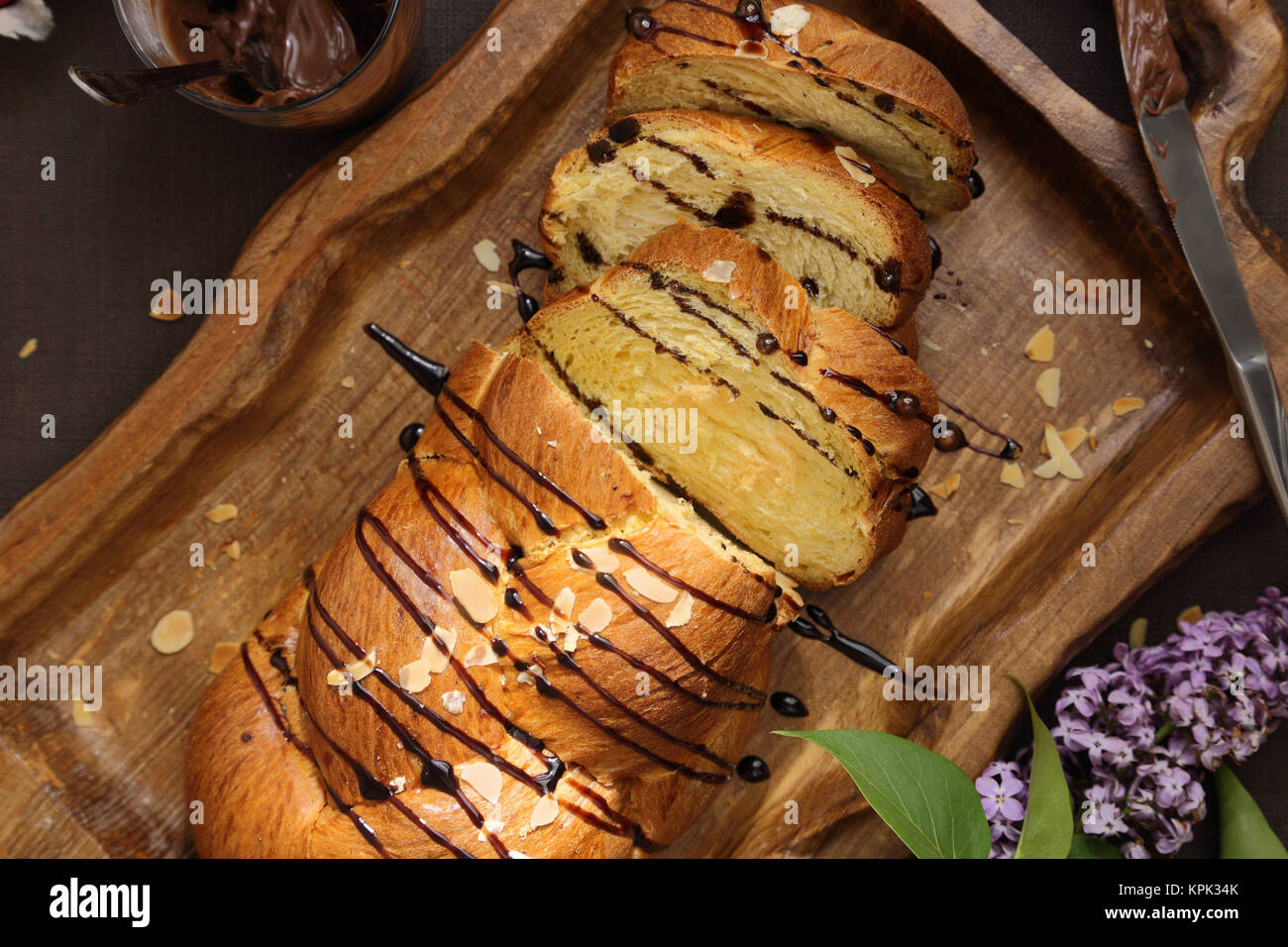 Sweet brioche bread on tray with chocolate spread Stock Photo - Alamy