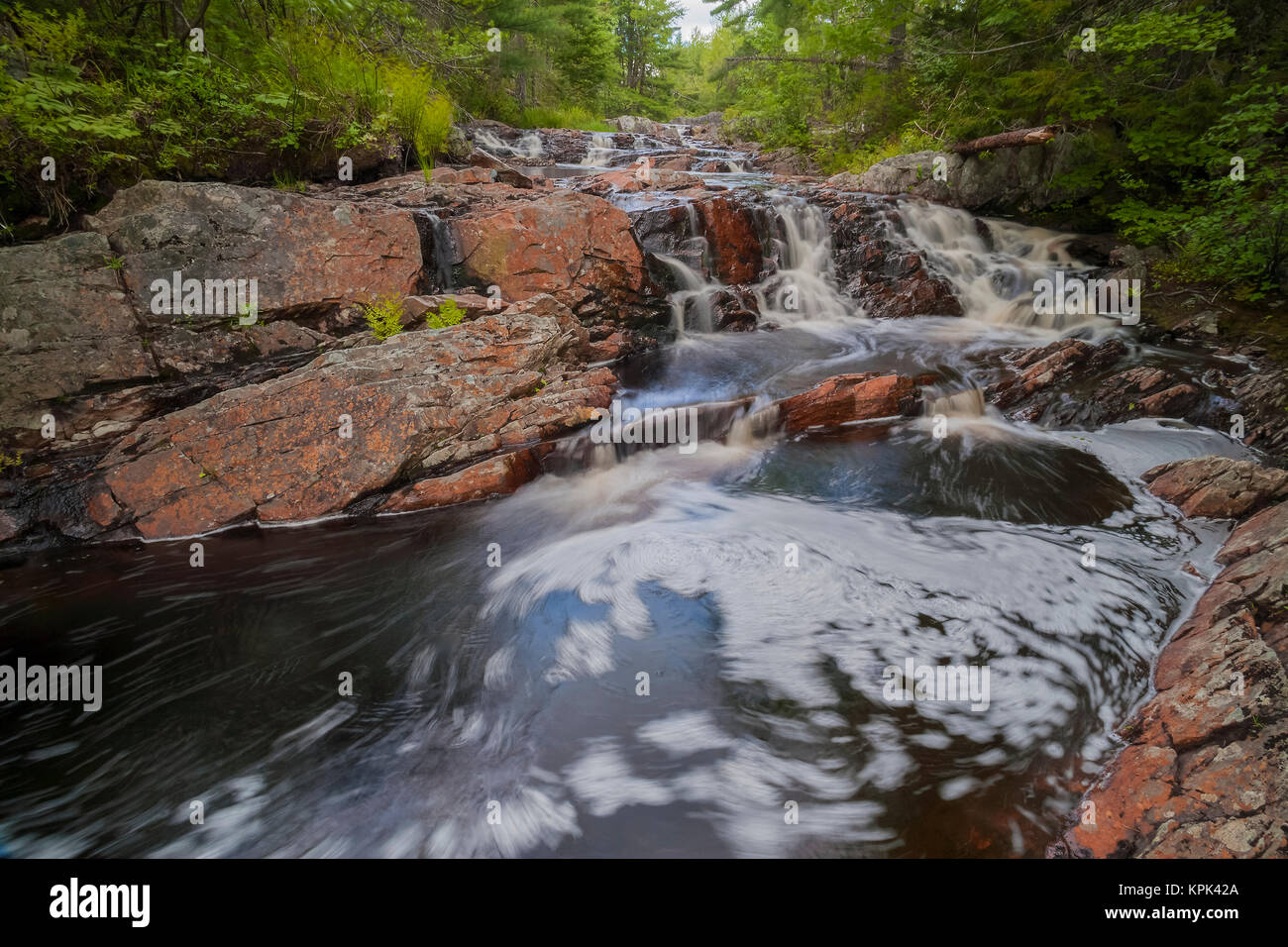 Terraced waterfalls in spring along Kings Brook, near Sleepy Cove ...