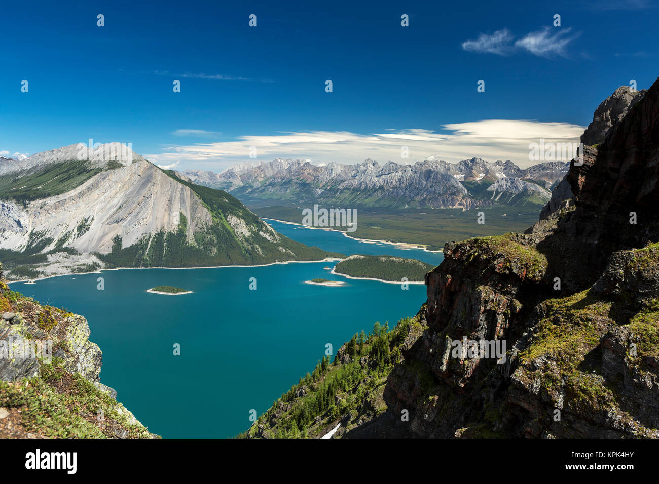View from the top of mountain ridge looking down on colourful alpine ...