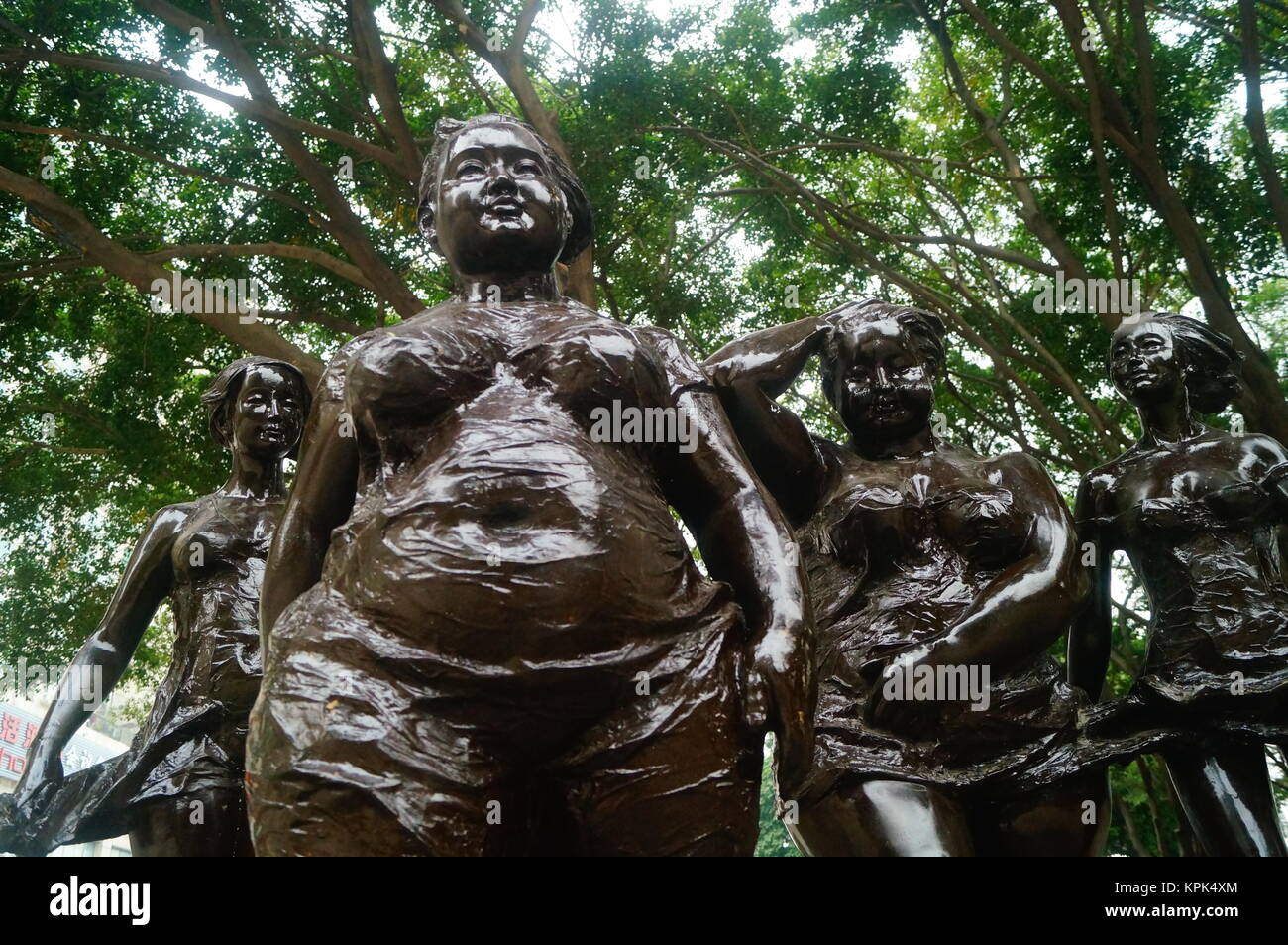 Urban sculpture landscape: female figure statues Stock Photo - Alamy