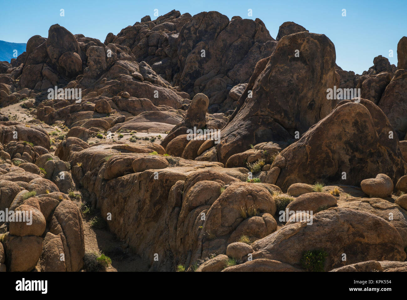 Rock formations in the Alabama Hills with blue sky; California, United ...
