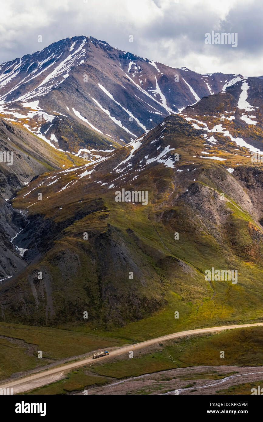 A truck approaches Atigun Pass along the Dalton Highway with the ...