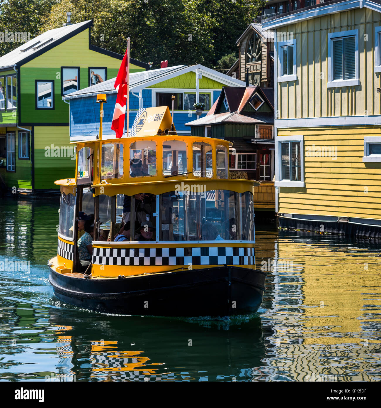 A small tour boat in Fisherman's Wharf in the Inner Harbour of Victoria ...