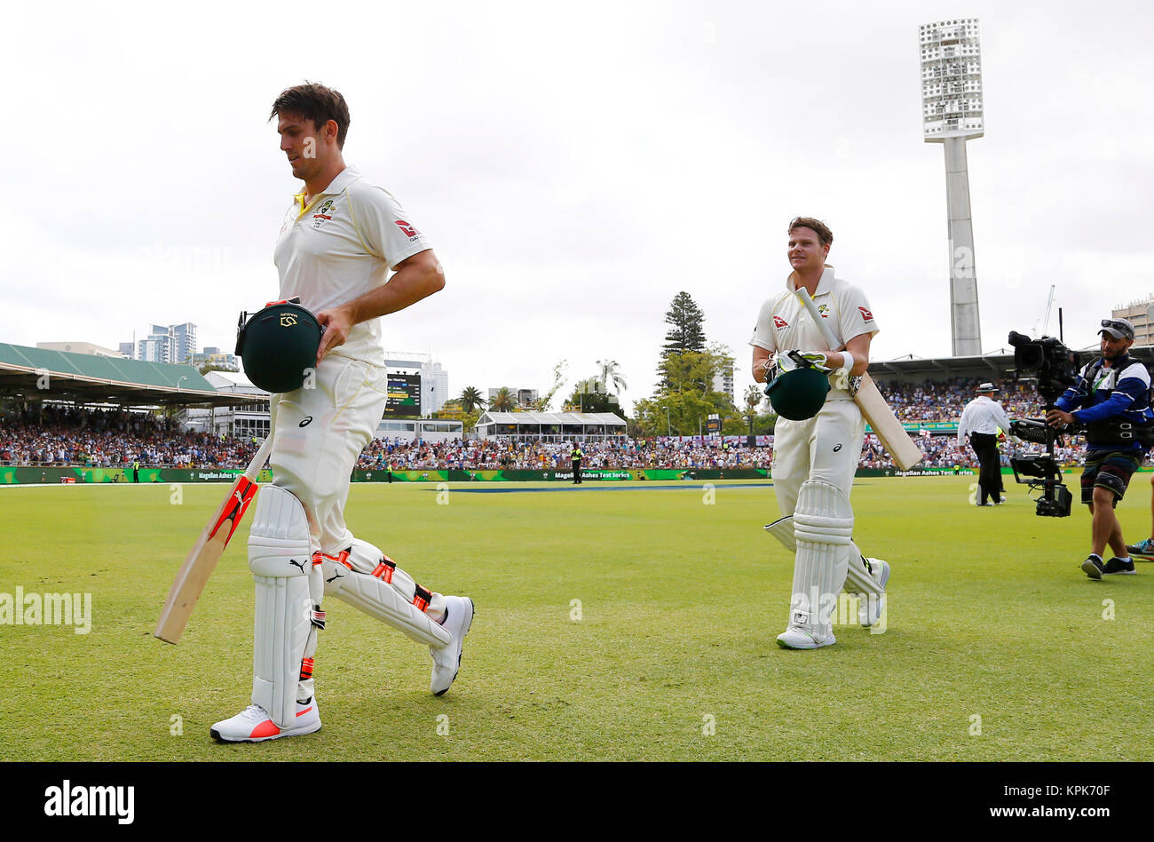 Australia's Mitchell Marsh walks off at tea with Steve Smith during day ...