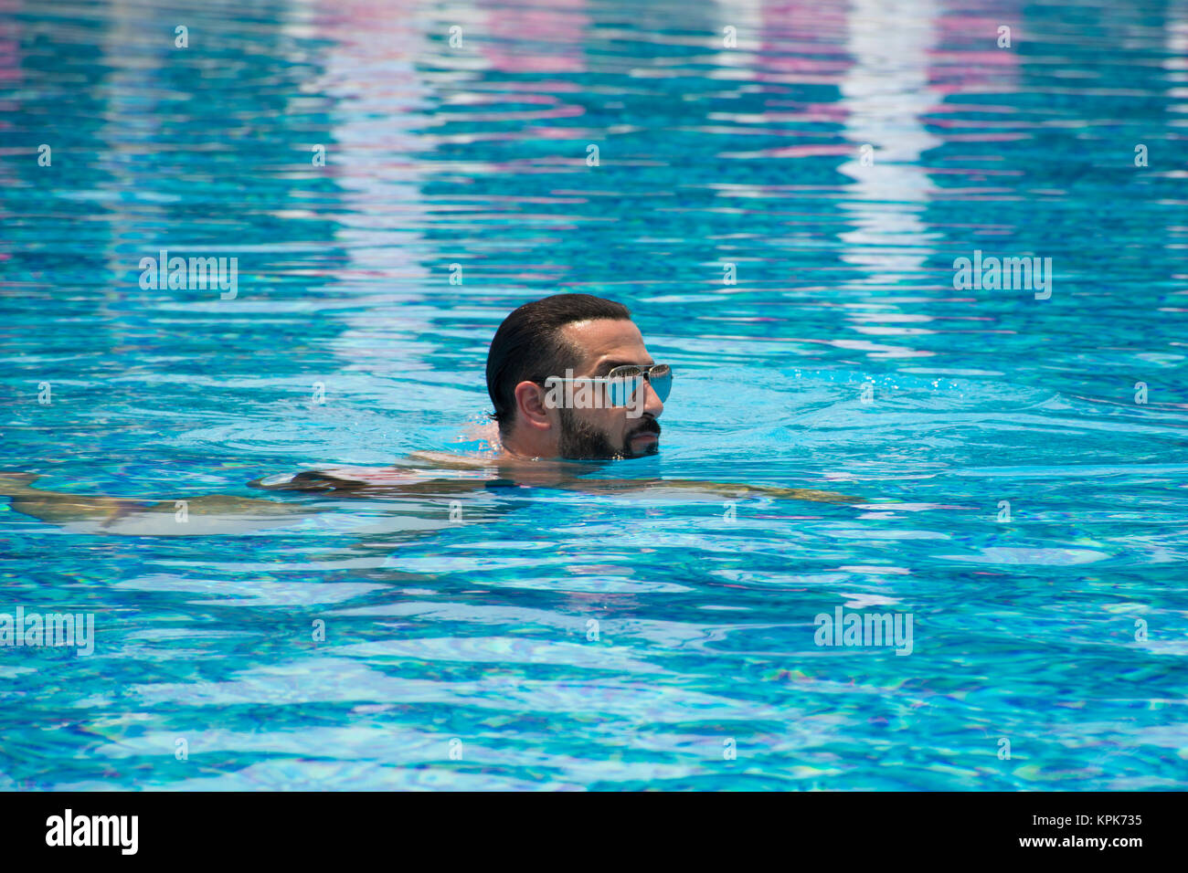 Men at swimming pool hi-res stock photography and images - Alamy