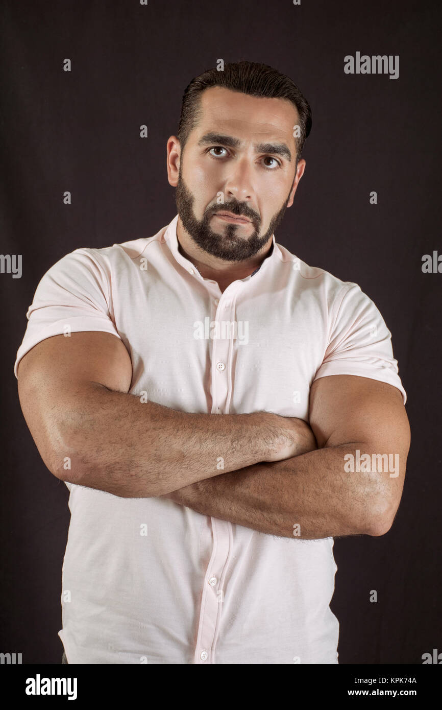 Arab man folded arms hi-res stock photography and images - Alamy