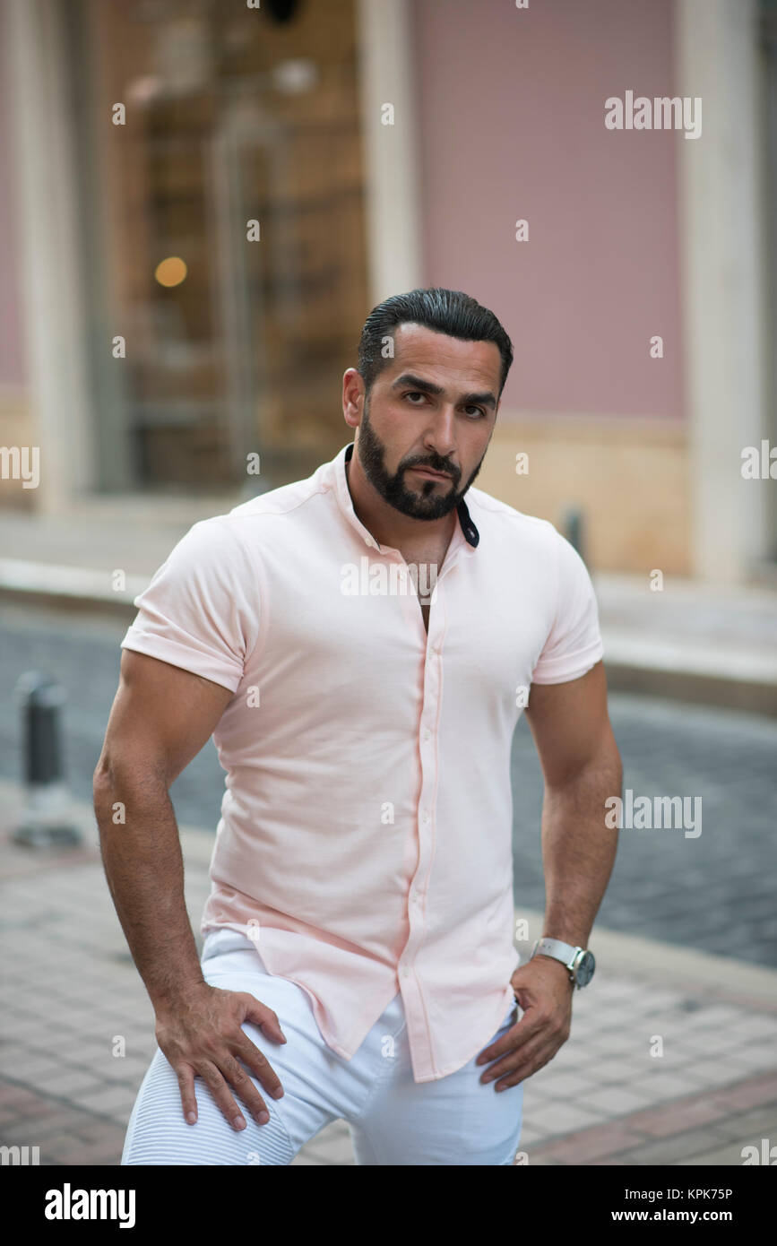 Portrait of a serious man staring outdoors Stock Photo - Alamy