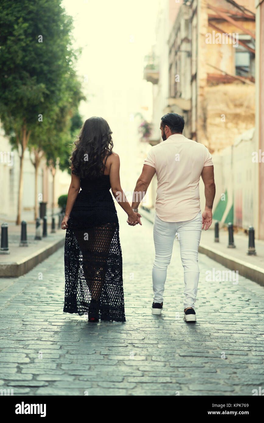 Arab men holding hands hi-res stock photography and images - Alamy