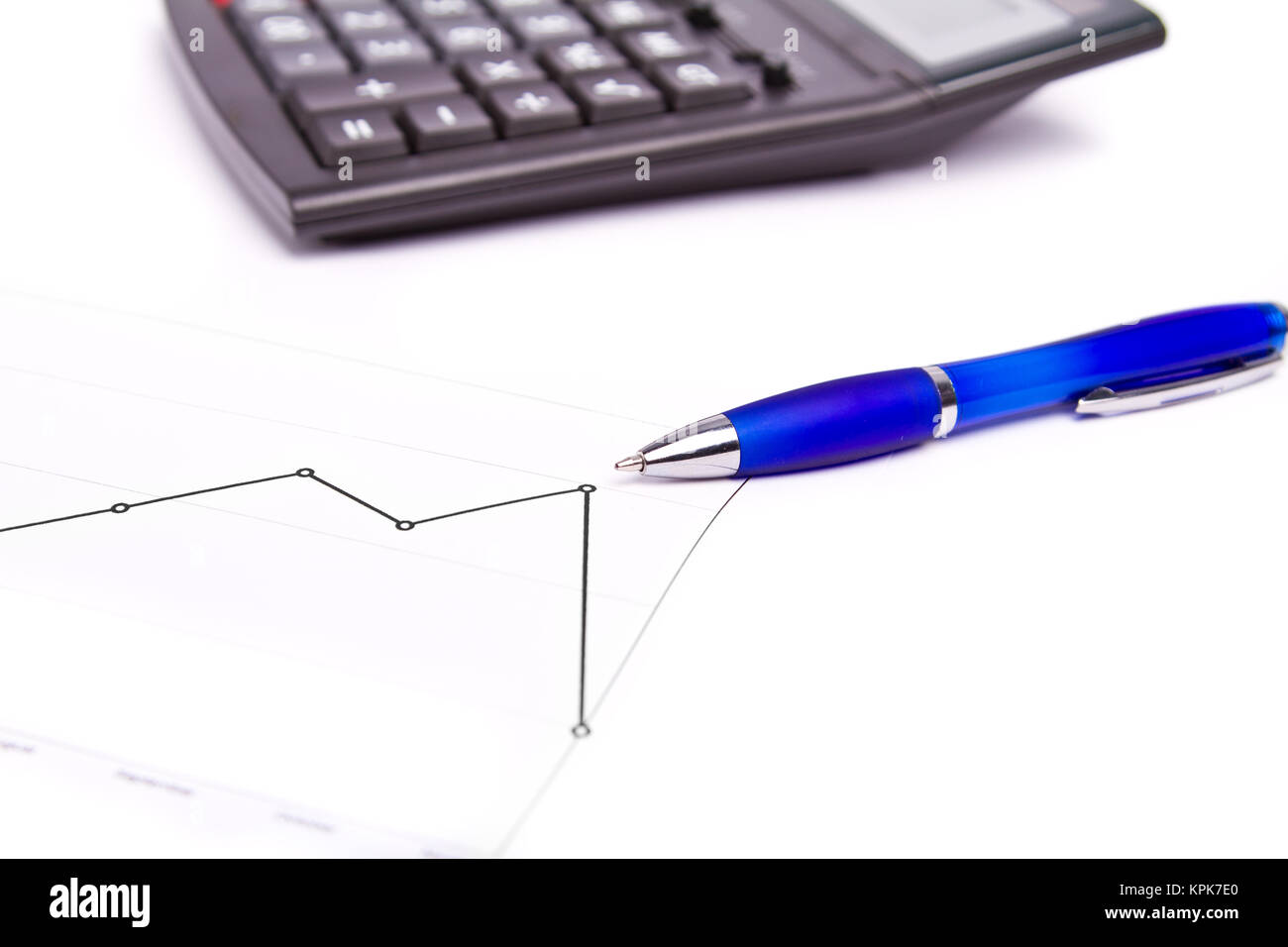 Pen pointing to a graph peak Stock Photo - Alamy
