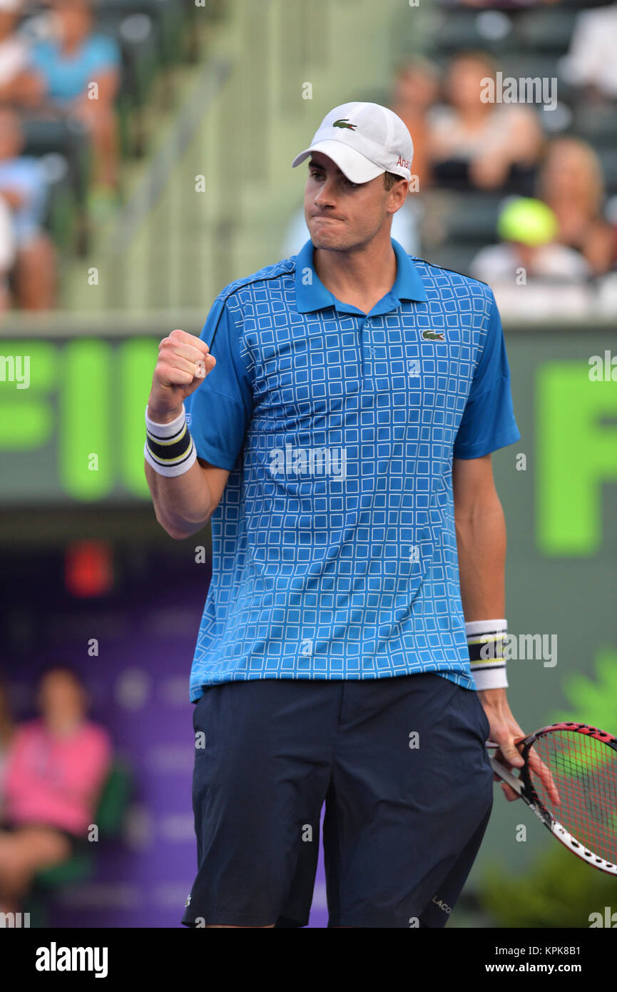 KEY BISCAYNE, FL - MARCH 22: John Isner of the USA defeats Donald Young ...