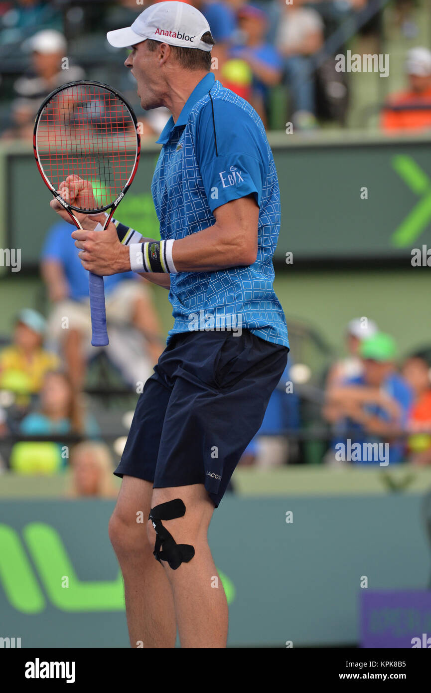 KEY BISCAYNE, FL - MARCH 22: John Isner of the USA defeats Donald Young ...