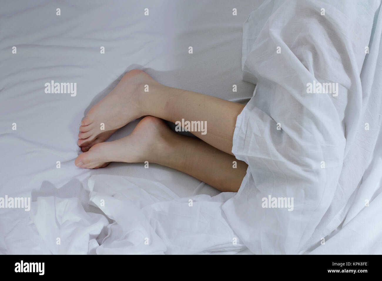Sleeping Woman Feet Stock Photo - Alamy