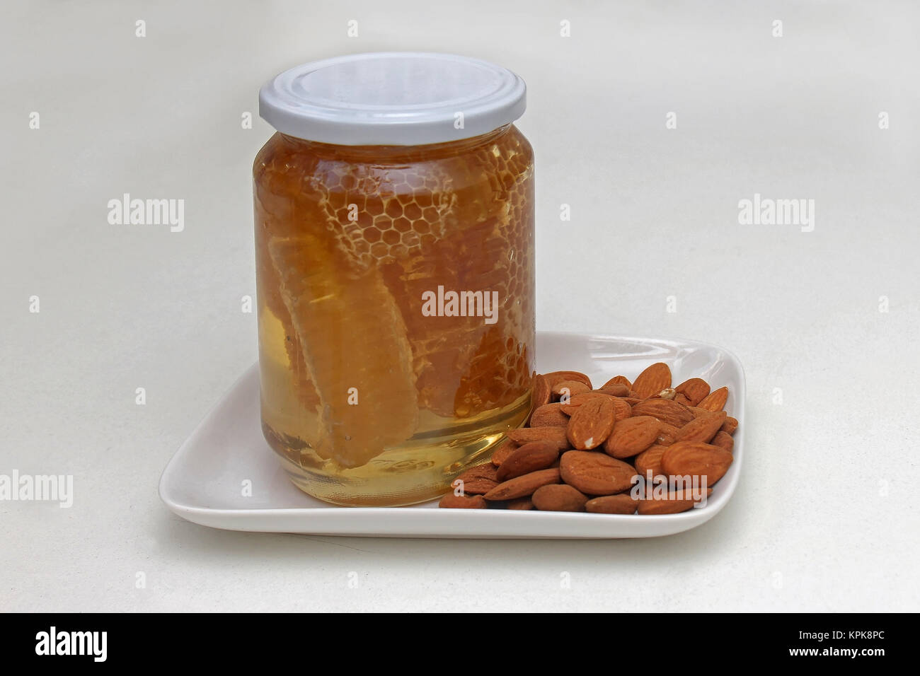 Comb honey jar Stock Photo - Alamy