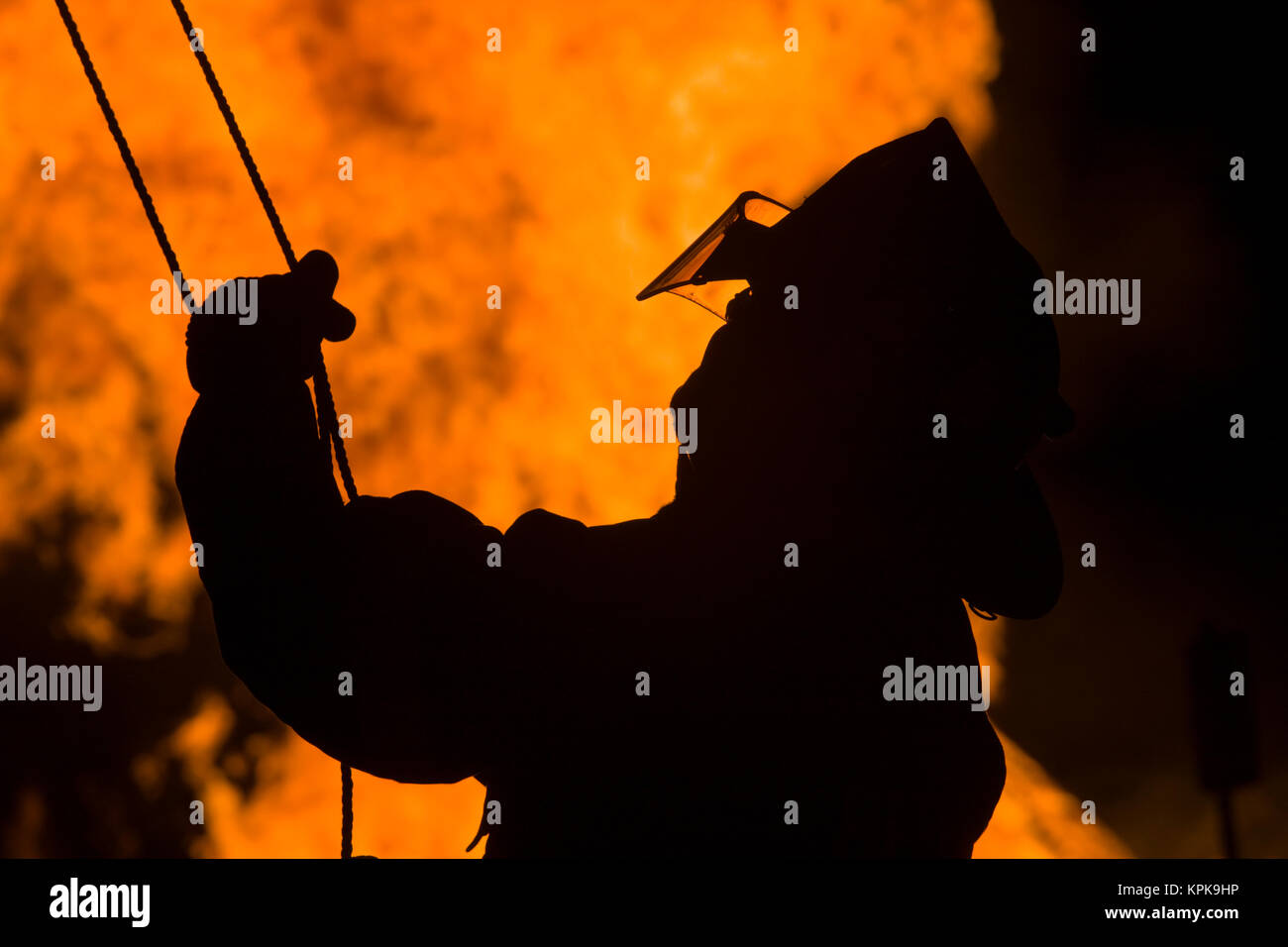 USA, Massachusetts, Cape Ann, Rockport. Fourth of July Bonfire, firemen ...