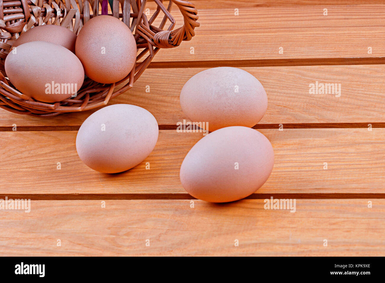 Eggs in a basket Stock Photo - Alamy