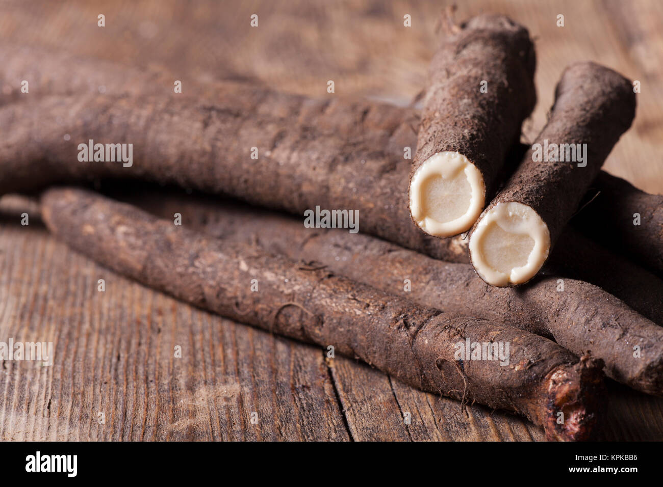 black root vegetables on wood Stock Photo - Alamy