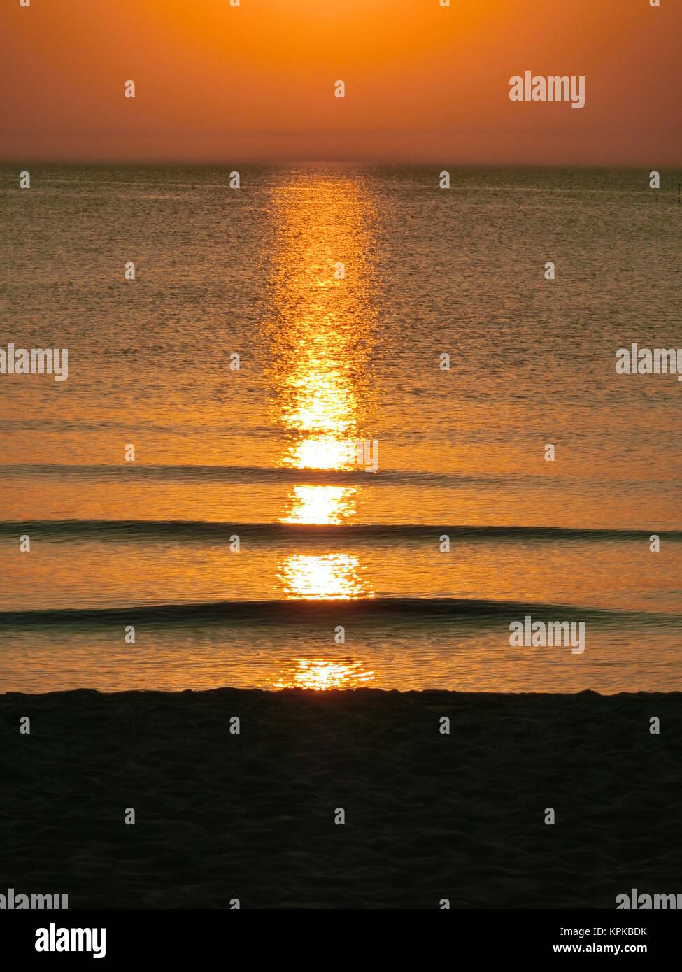 moody sunset at sea Stock Photo - Alamy