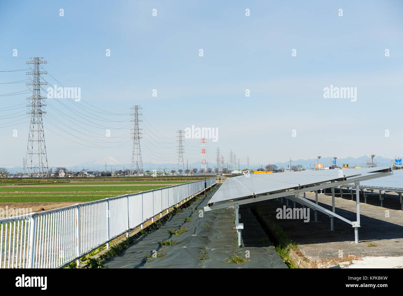 Power line and solar panel Stock Photo - Alamy
