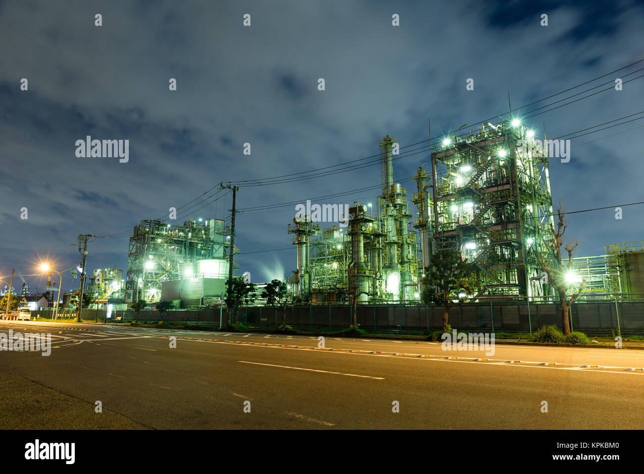Industrial factory at night Stock Photo - Alamy