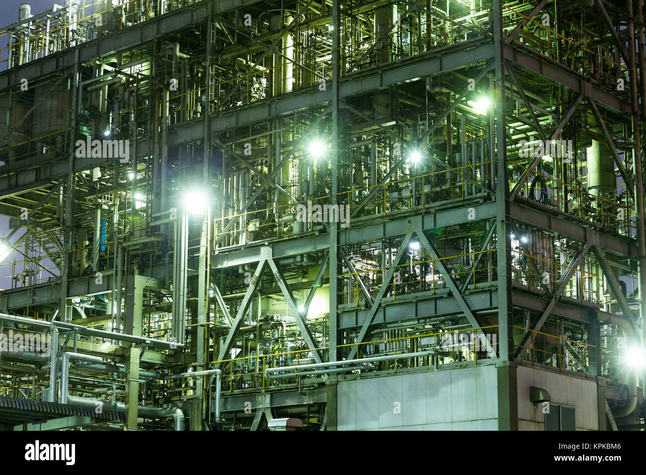 Factory working at night Stock Photo - Alamy