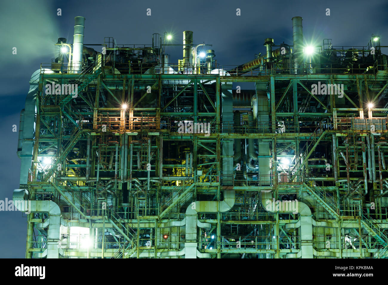 Industrial manufacturing Factory at night Stock Photo - Alamy