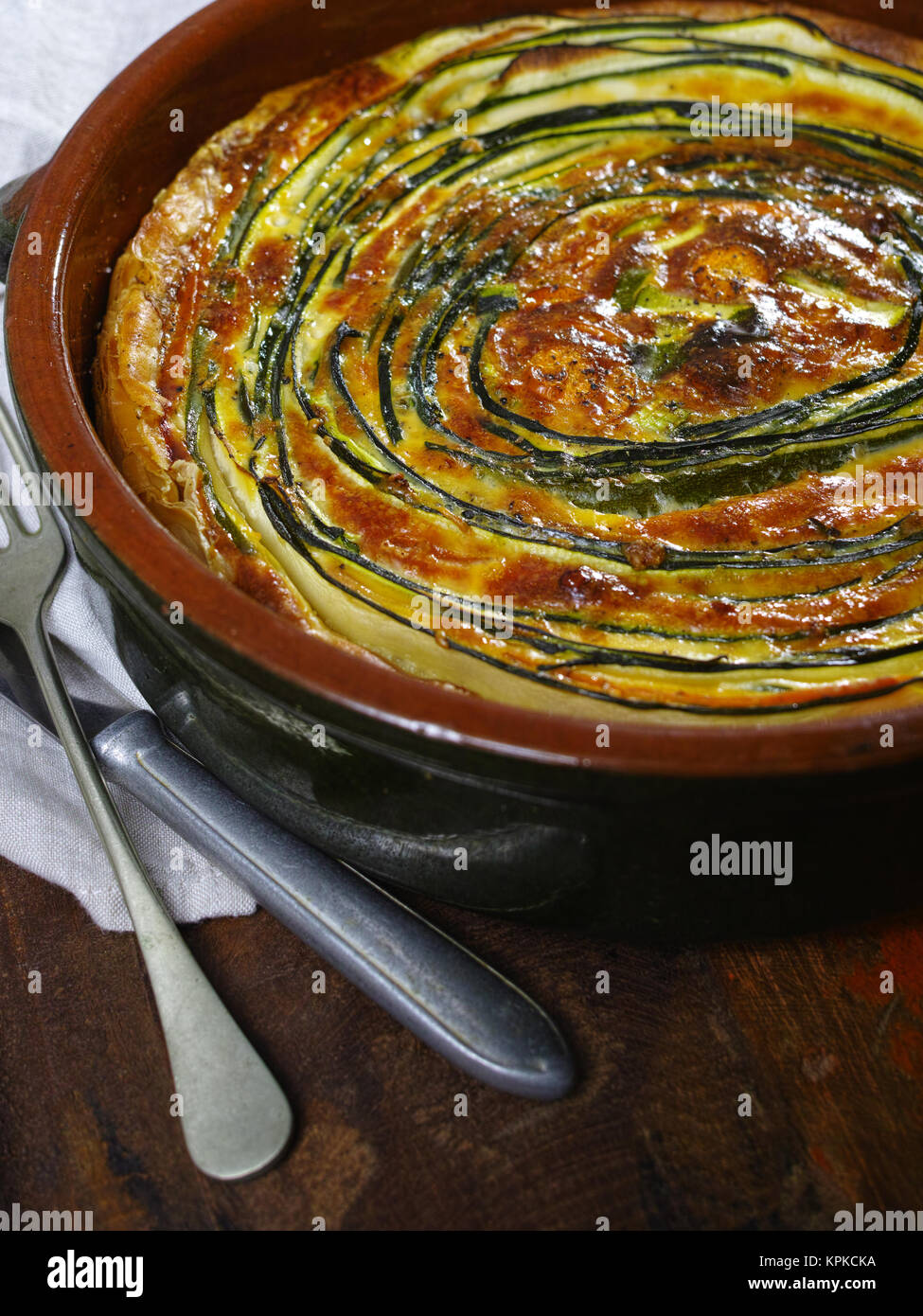 Homemade traditional quiche vegetable pie with green courgette and ...