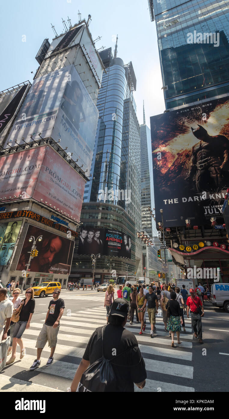 NEW YORK CITY - JULY 12: Undefined people pass through Times Square on ...
