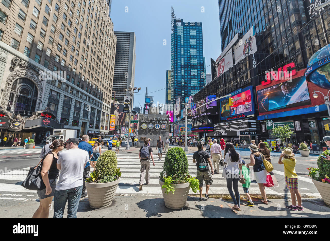 NEW YORK CITY - JULY 12: Undefined people pass through Times Square on ...