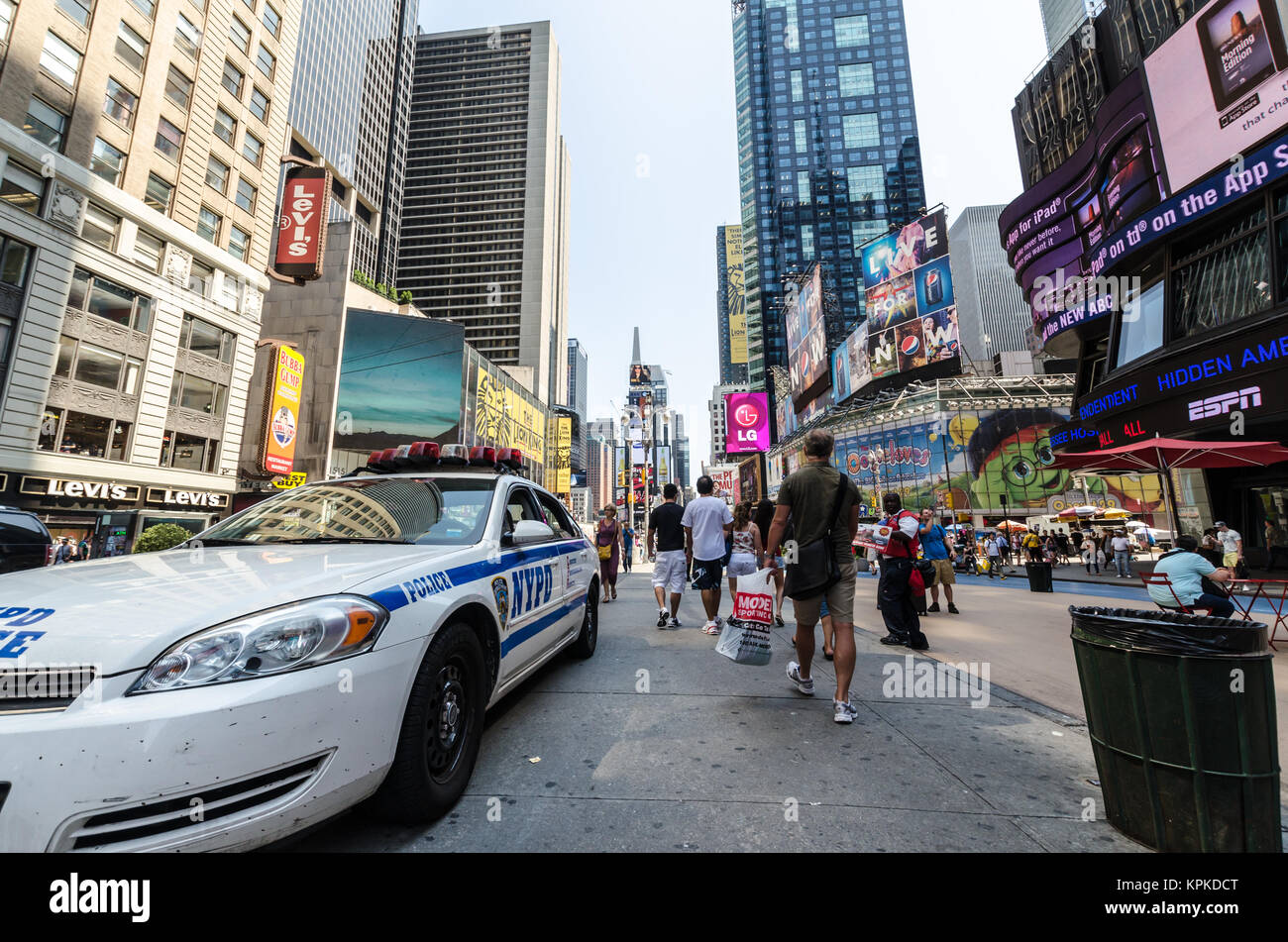 NEW YORK CITY - JULY 12: Undefined people pass through Times Square ...