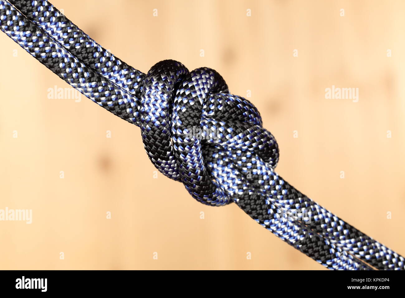 simple knots with wood background Stock Photo - Alamy