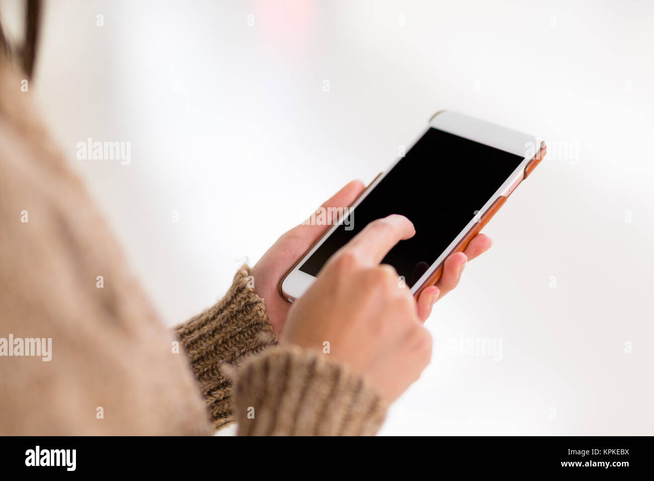 Woman finger touch on screen of mobile phone Stock Photo - Alamy