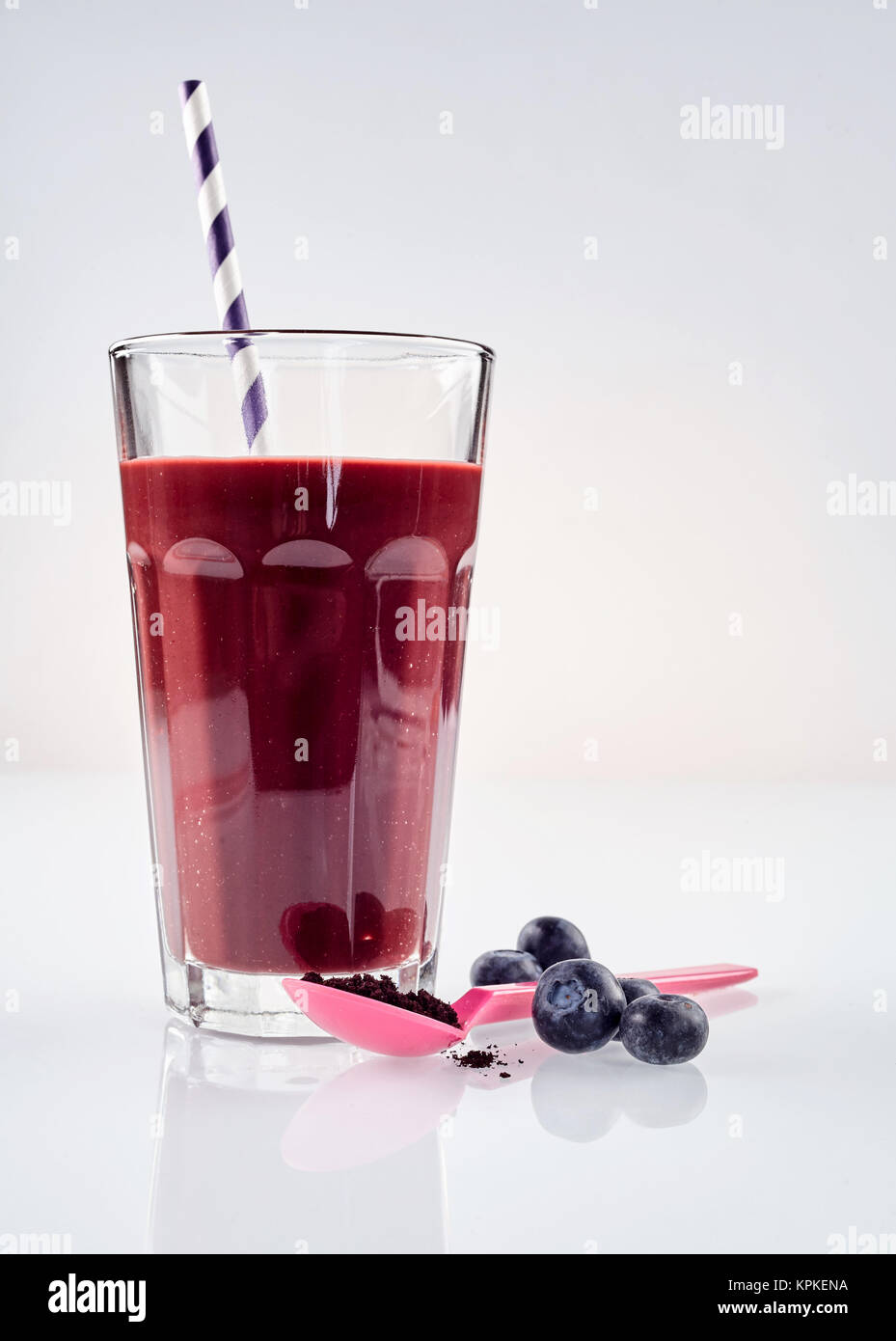 Single large glass of fresh blueberry and exotic acai berry blended ...