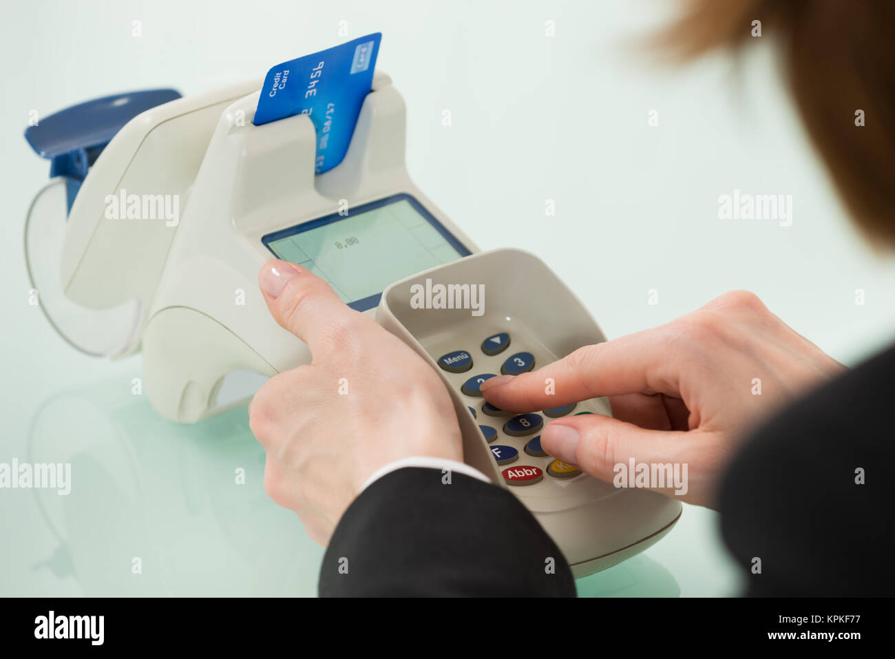 Woman Hand Using Credit Card Machine Stock Photo - Alamy