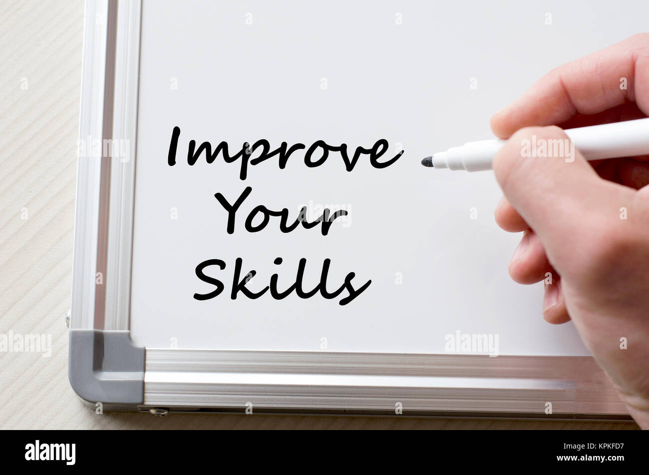 Improve your skills written on whiteboard Stock Photo - Alamy