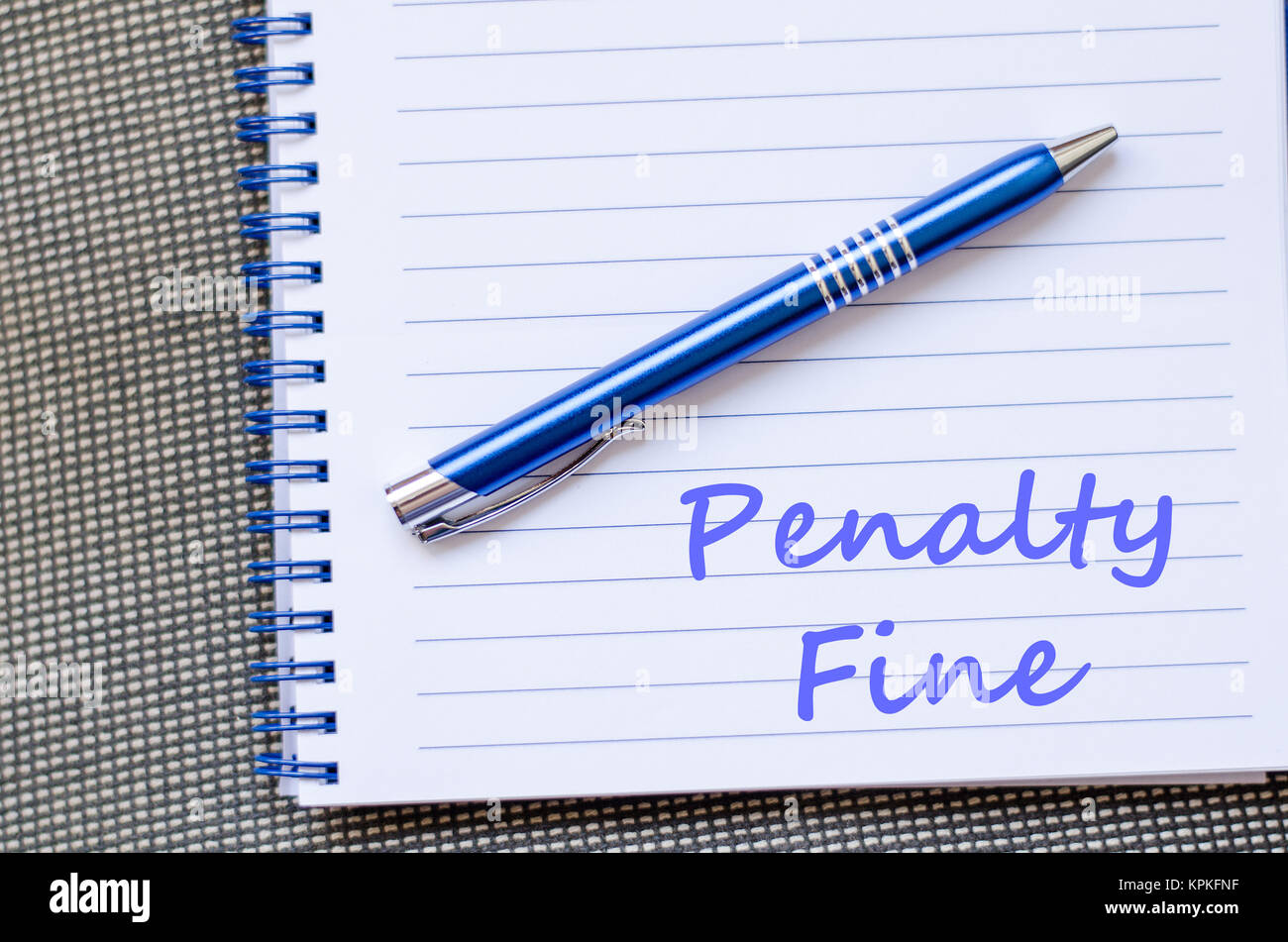 Penalty fine write on notebook Stock Photo - Alamy