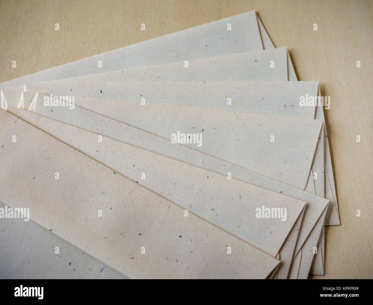 Letter envelopes for mail postage on wooden table Stock Photo - Alamy