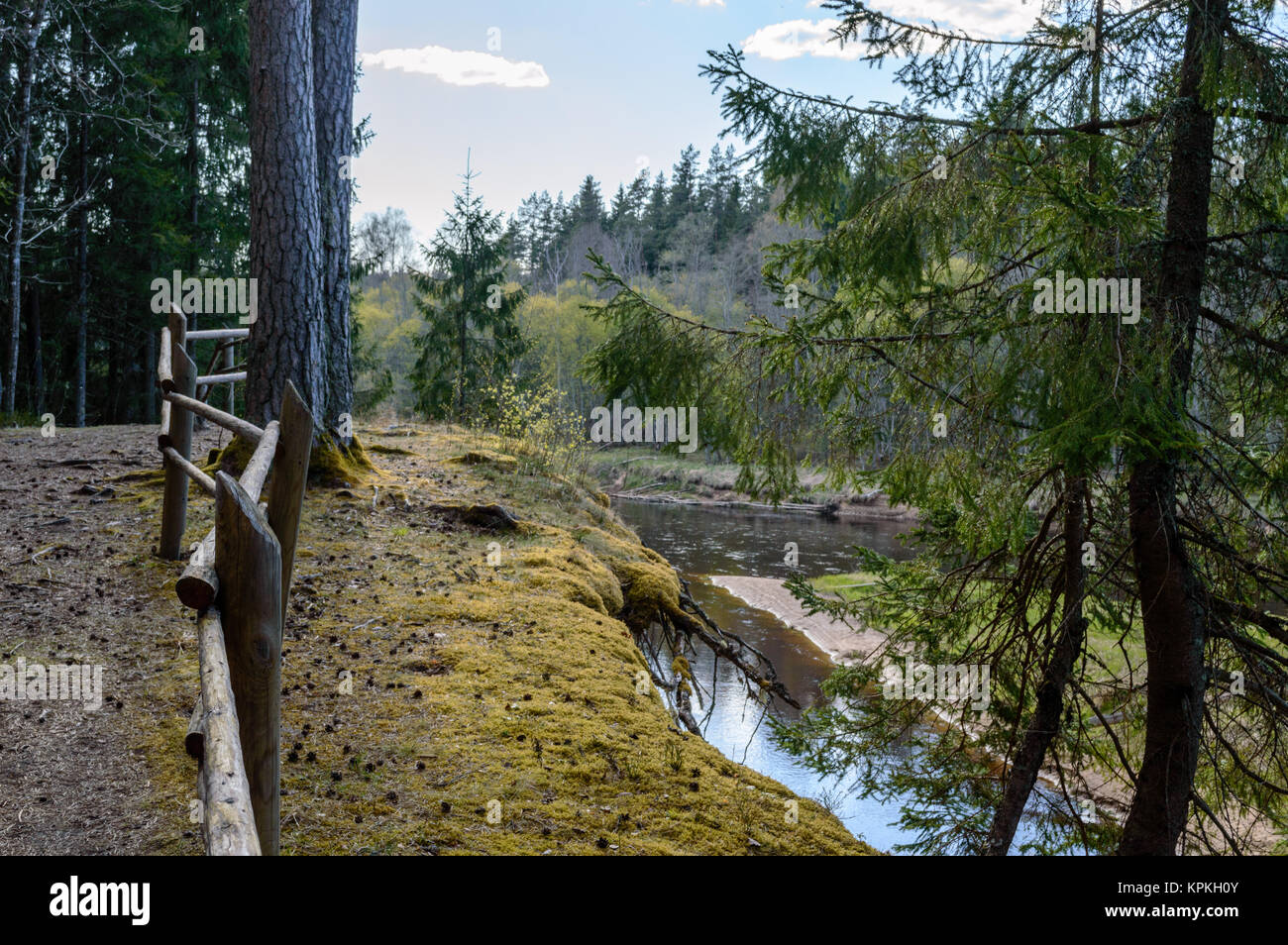 camping and resting area by the river with bench and fireplace. natural ...