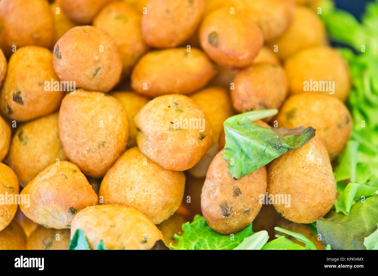 fried dough balls with aromatic herbs and cheese, excellent as an ...