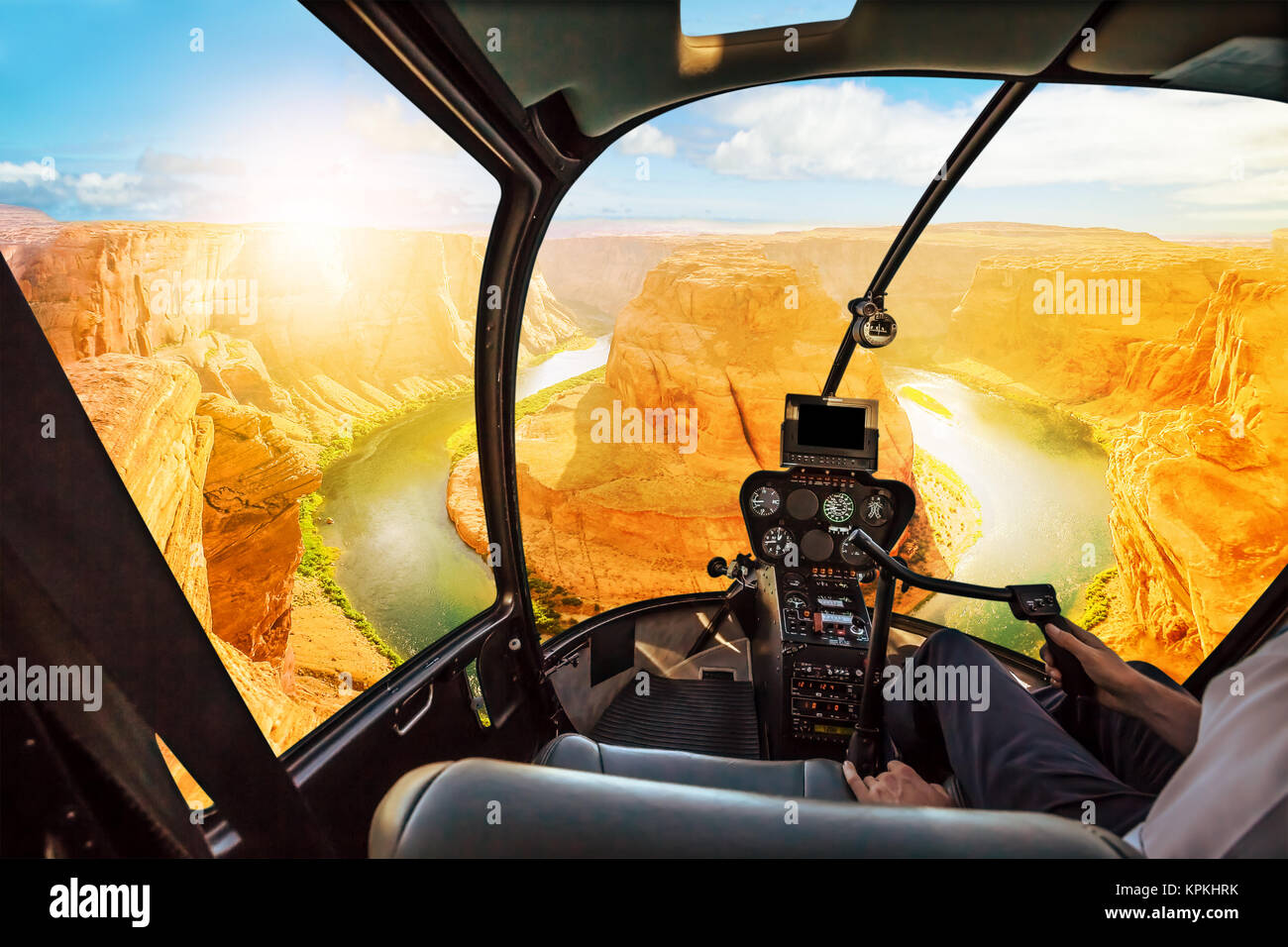 Helicopter cockpit scenic flight over Horseshoe Bend of Colorado River ...