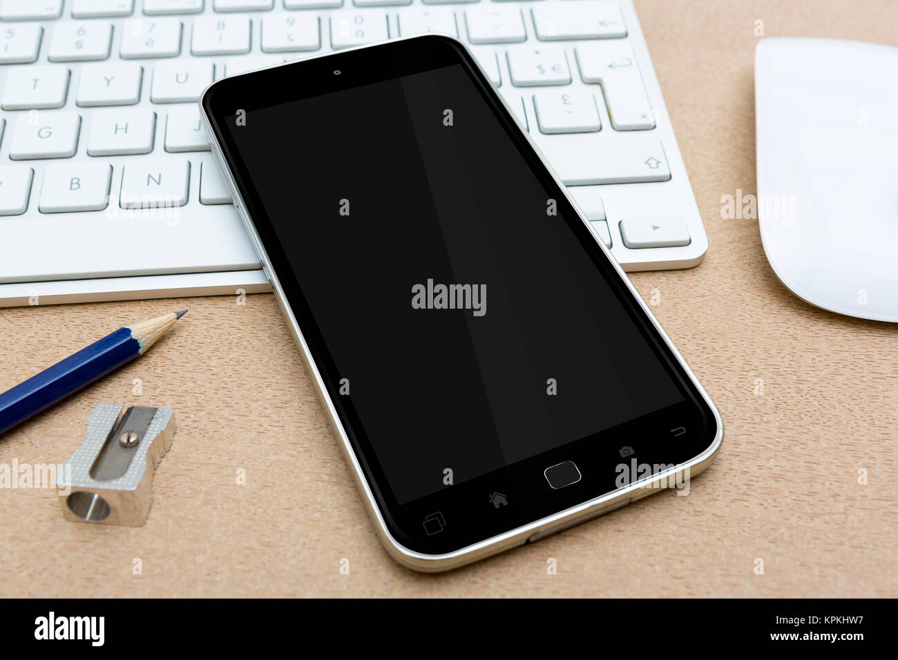 Workplace with mobile phone Stock Photo - Alamy