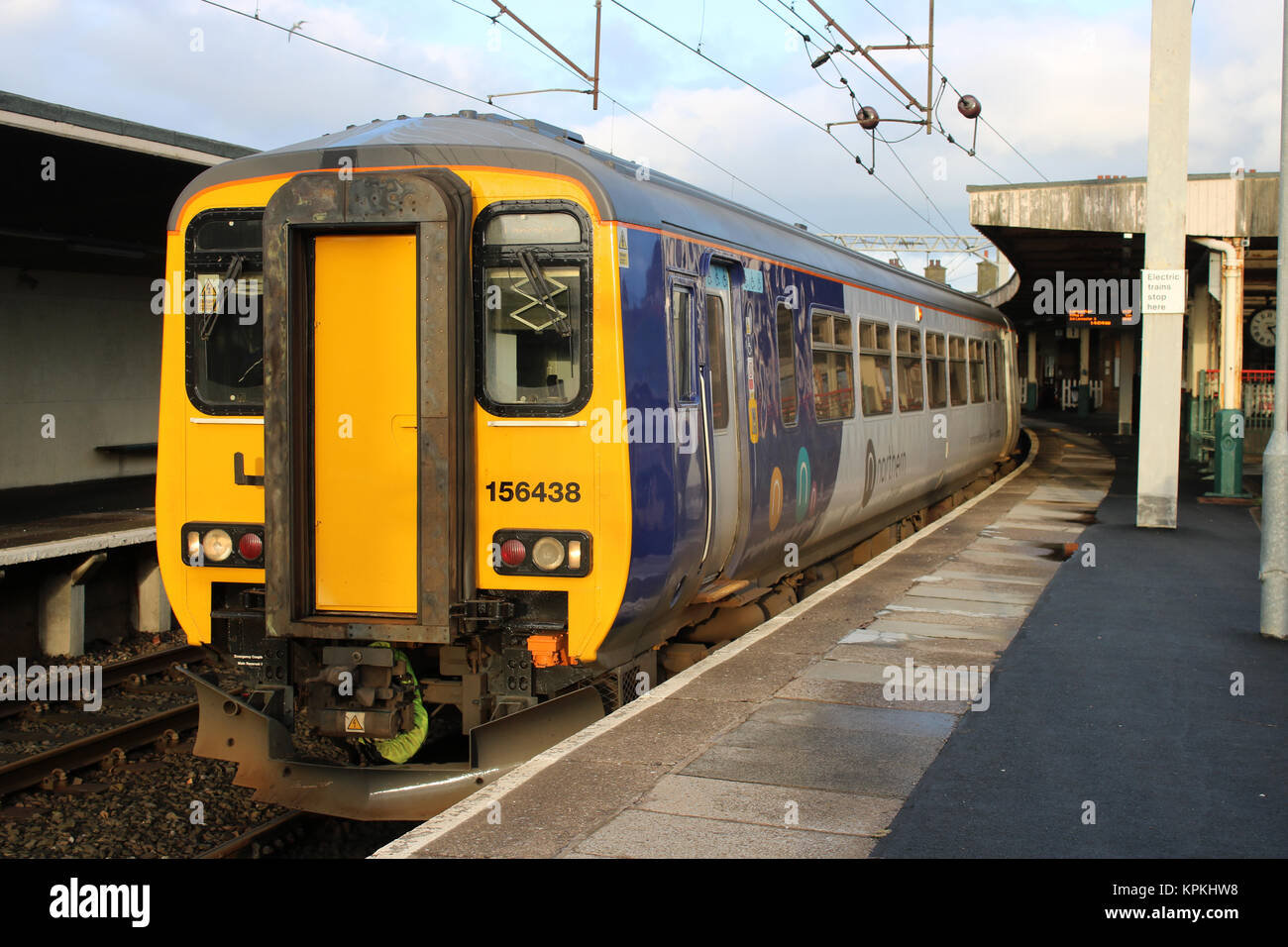 Class 156 diesel multiple unit train at Carnforth station with a ...