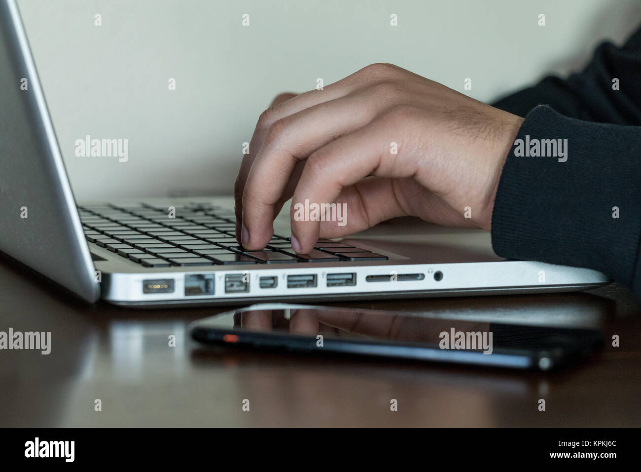 Young business man multitasking Stock Photo - Alamy
